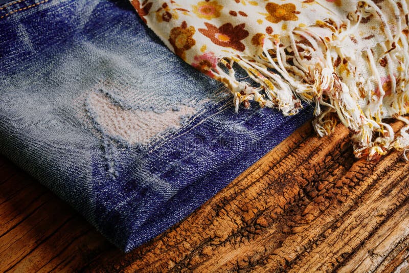 Torn Jeans wiht scarf stock image. Image of repair, abstract - 37098875