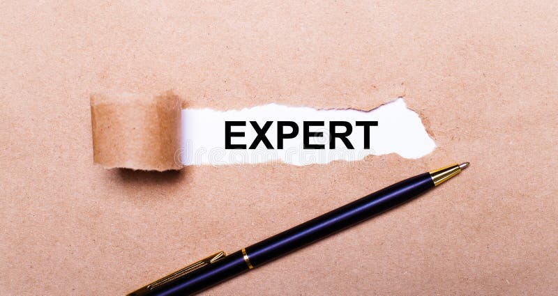 Torn Kraft Paper, White Background with the Text EXPERT. Nearby is a ...