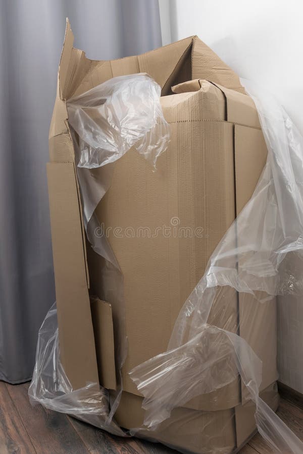 Torn Large Box Indoors Against the Wall Stock Image - Image of ...