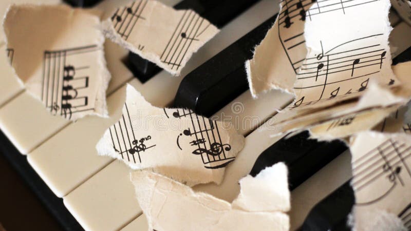 Torn Musical Notes, Pieces of Paper on Piano, Top View Stock Photo ...