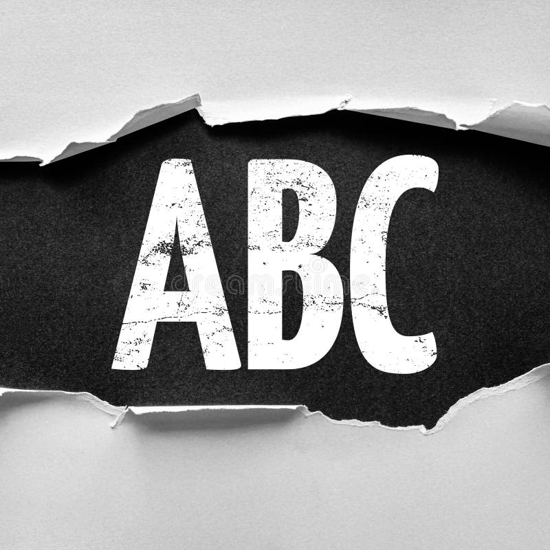 Torn Paper Design Revealing the Bold Letters ABC in Large, Distressed ...