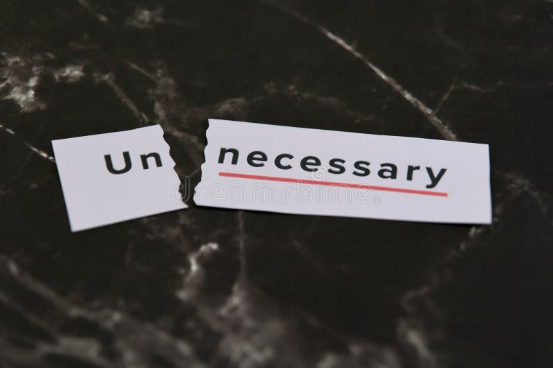 Torn Paper Displaying Unnecessary Text on Dark Surface Stock Image ...