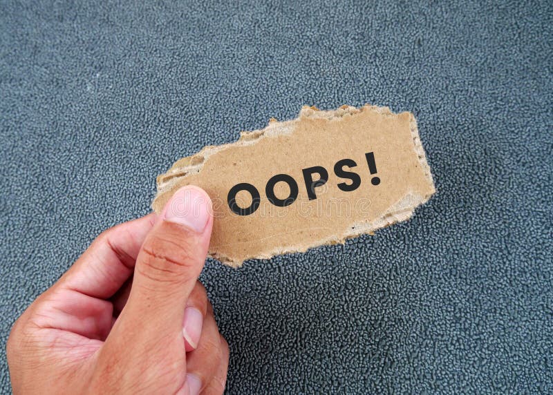 Torn Paper in Man S Hand with OOPS Stock Photo - Image of hold, paper ...