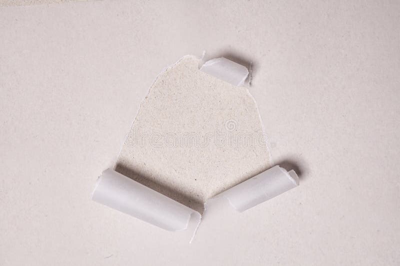 Torn Paper with Opening Showing Cardboard Paper Background. Stock Image ...