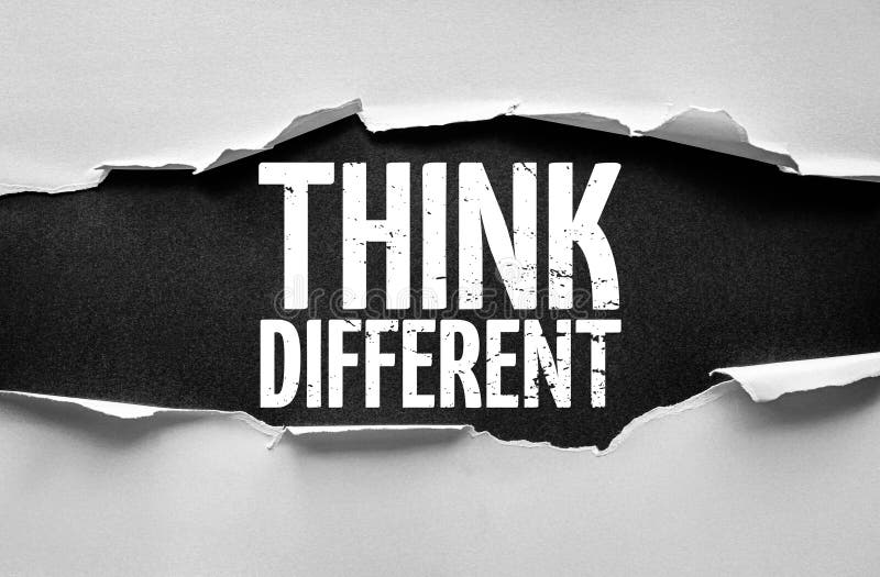 Torn Paper Revealing the Bold Phrase Think Different, Symbolizing ...