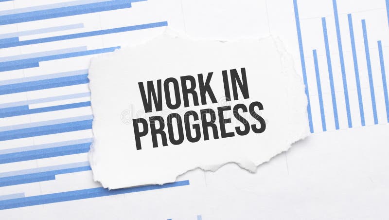 Work in Progress Word Inscription on White Card Paper Sheet in Hands of ...