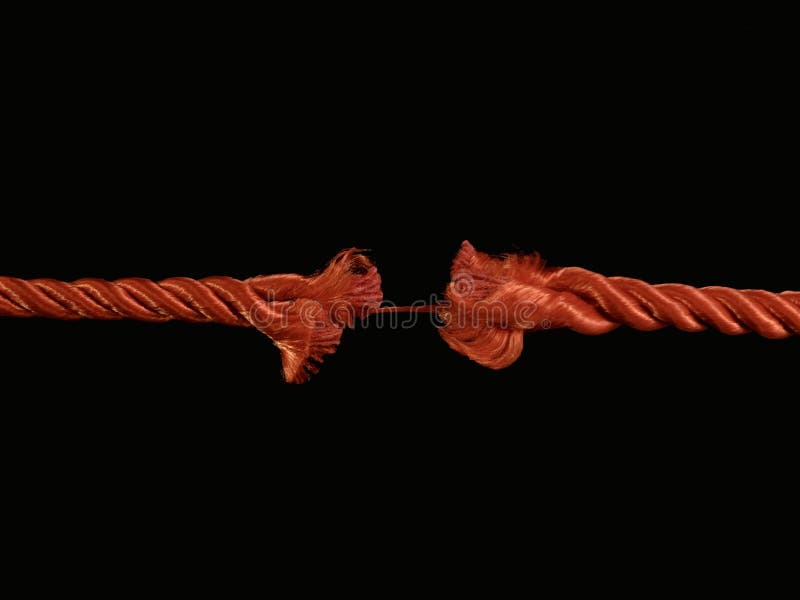 The Torn Rope is about To Break, a Black Background. the Rope is Held ...