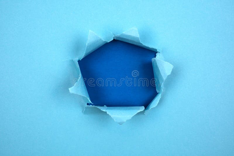 Torn Round Hole in Cyan Blue Paper with Torn Edges and a Blue ...