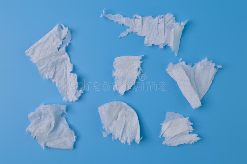 Torn Tissue Papers Isolated on a Blue Background Stock Photo - Image of ...