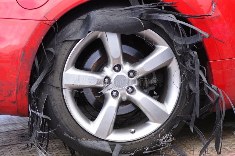 Torn Tyre of a Damaged Sport Car after Race Stock Image - Image of ...