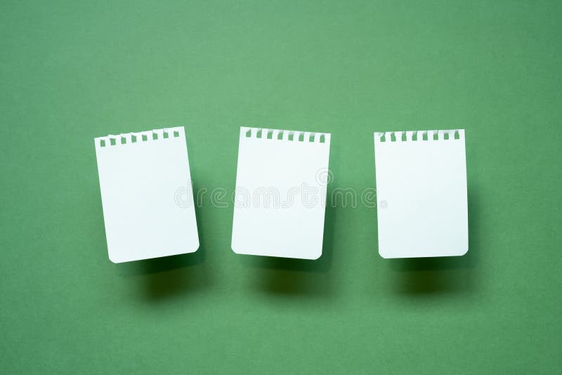 Torn White Paper Note Sheet Isolated on Green Desk Stock Photo - Image ...