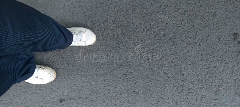 Torn White Shoes on the Hot Asphalt Stock Photo - Image of white, torn ...