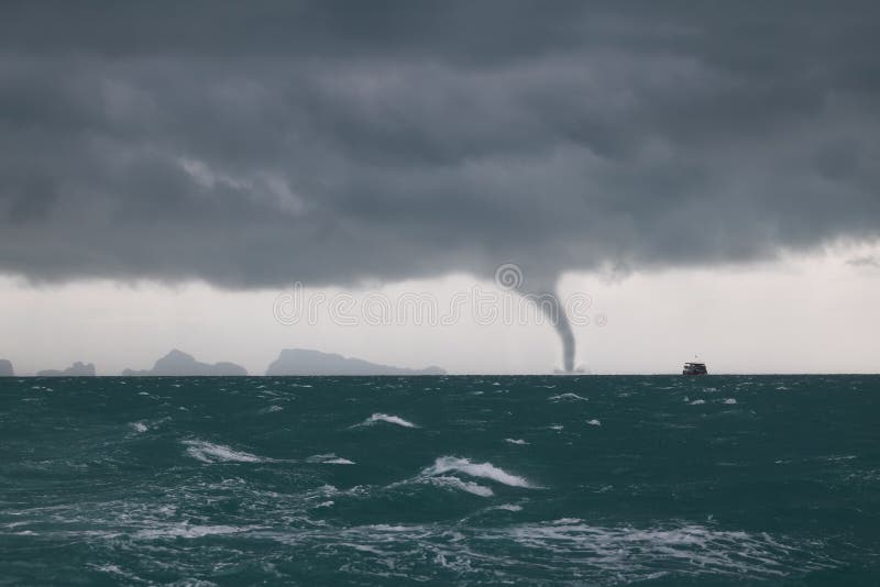 Tornado and Storm Cloud in the Sea while the Ship is Sailing Stock ...
