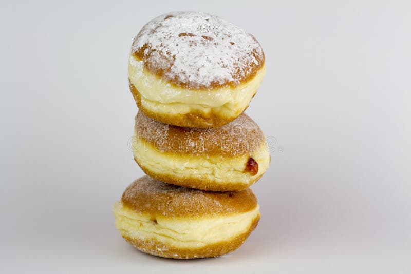 Poonchkies Donuts Som Dammas Av Med Pudrat Socker Och Fylls ...