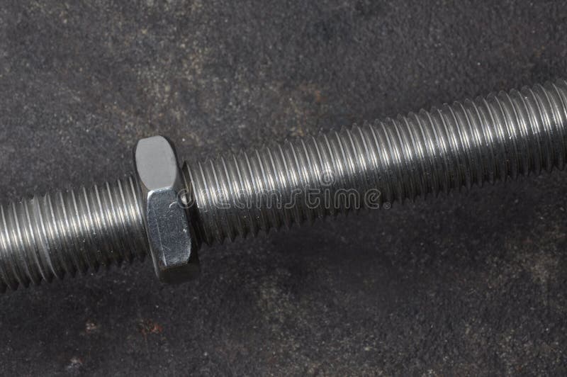 Tornillo Roscado Con Una Tuerca Foto de archivo - Imagen de extracto ...