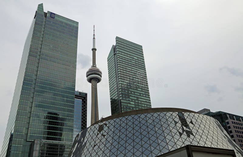 CN Tower between buildings editorial stock photo. Image of canada ...