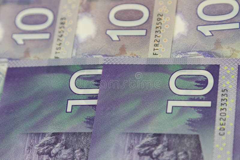 Canadian $10 Dollar Bills on a Table, Canadian Currency Stock Image ...