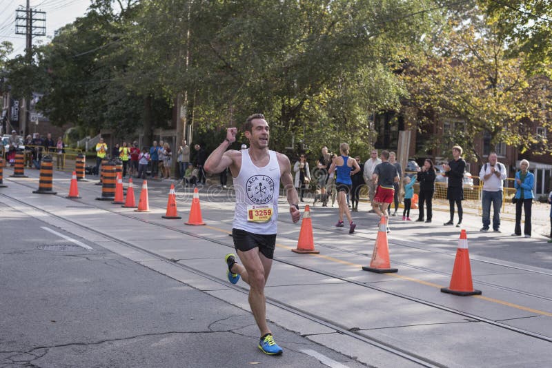 TORONTO, on/CANADA - OCT 22, 2017: Marathon Runner Daniel Passing the ...