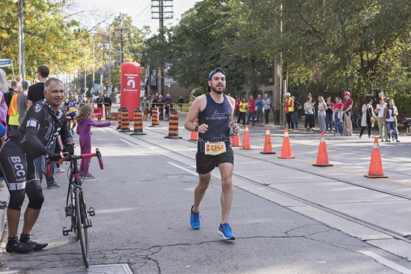 TORONTO, on/CANADA - OCT 22, 2017: Marathon Runner Mathieu Passing the ...