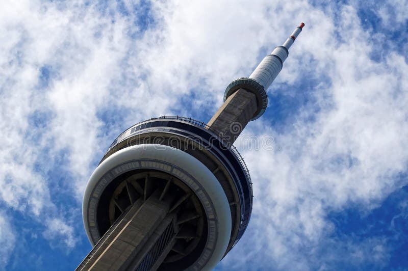 Toronto Needle. CN Tower Spire Piercing Blue Sky of Toronto Editorial ...