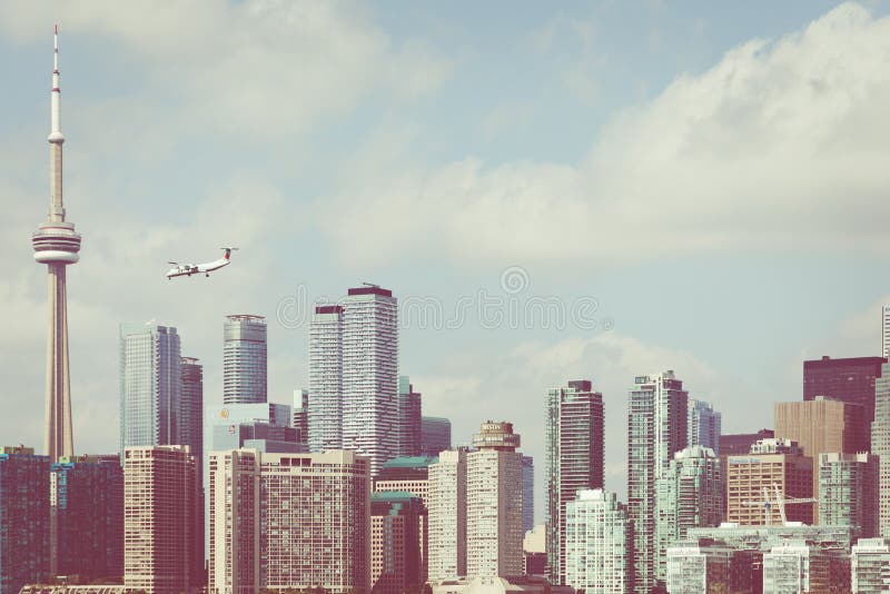 Toronto Skyline and Landing Plane. Toronto, Ontario, Canada. Editorial ...