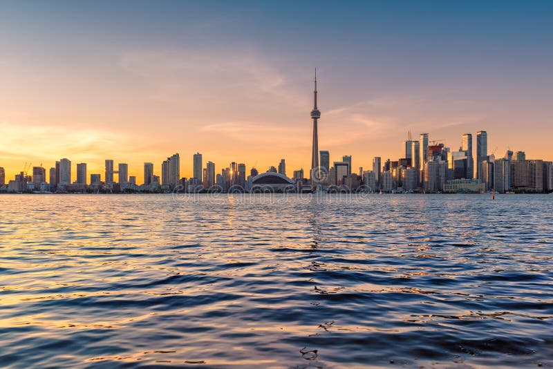 Toronto skyline at sunset stock photo. Image of landmark - 132066320