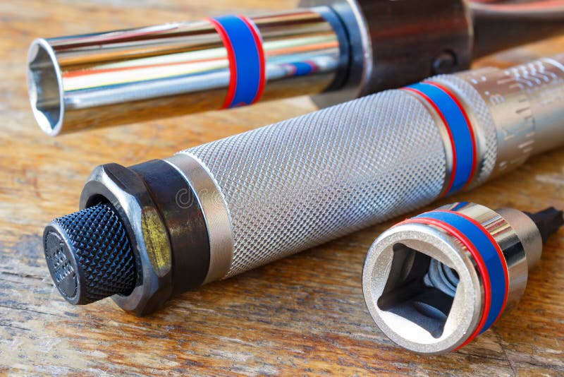 Torque Wrench Handle on a Wooden Table Closeup Stock Image - Image of ...