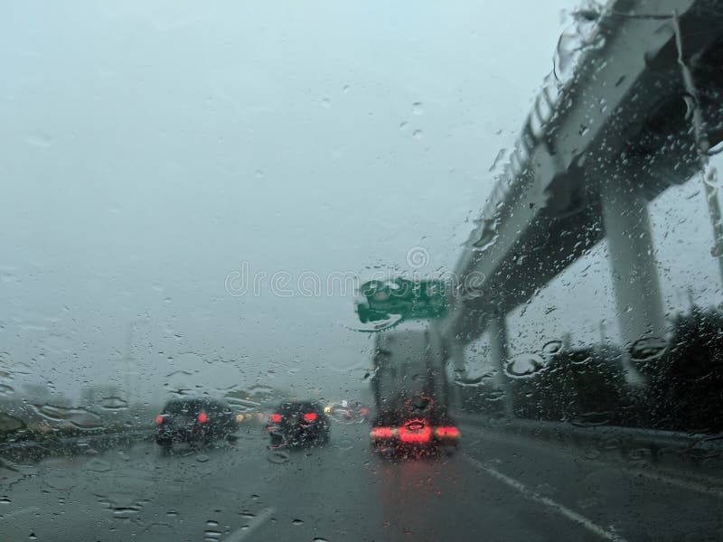 A Torrential Downpour in Traffic Stock Photo - Image of raining, storm ...