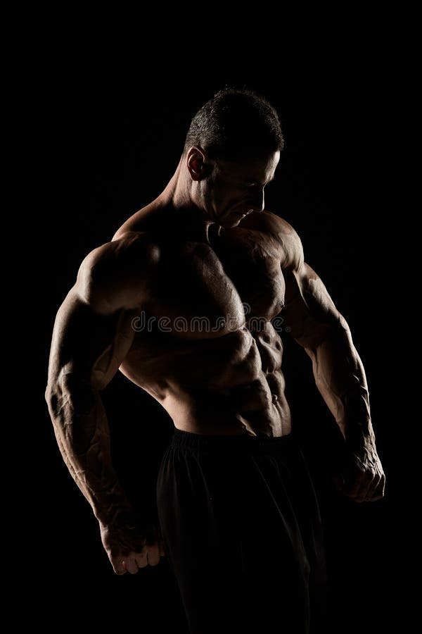 Torso Of Attractive Male Body Builder On Black Background. Stock Image ...