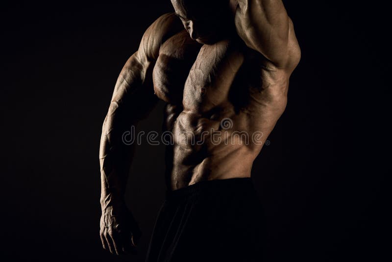 Torso of Attractive Male Body Builder on Black Background. Stock Image ...