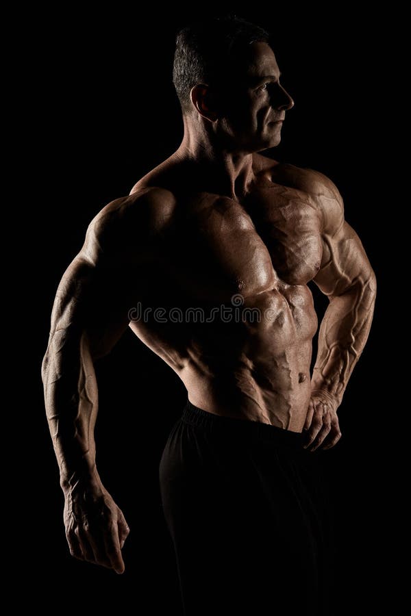 Torso of Attractive Male Body Builder on Gray Background. Stock Photo ...