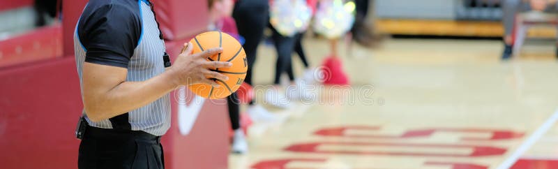 Torso of a Basketball Referee Holding Ball on the Court Editorial Photo ...
