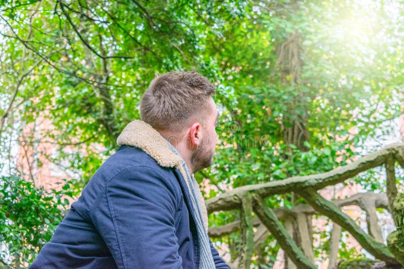 Torso of Young Man Looking into Infinity in a Park Stock Photo - Image ...