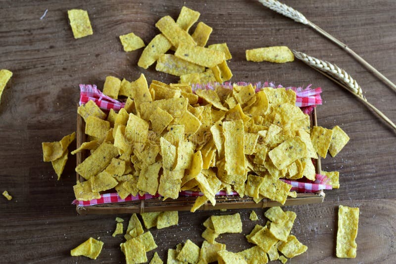 Tortilla Chips are a Snack Made from Corn that is Cut into Squares and ...