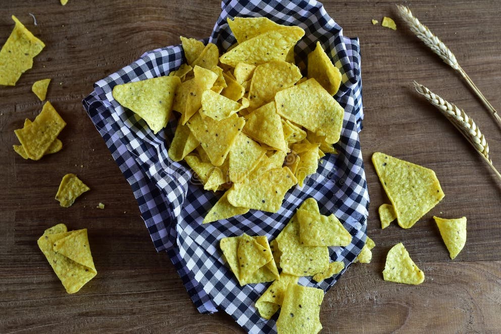Tortilla Chips are a Snack Made from Corn that is Cut into Triangles ...