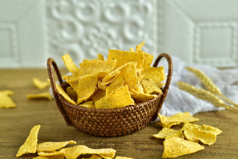 Tortilla Chips are a Snack Made from Corn that is Cut into Triangles ...