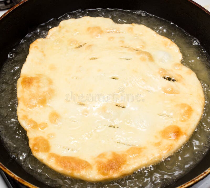 Tortilla is fried in a pan stock image. Image of frying - 112101303