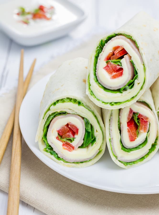 Tortilla Roll with Soft Cheese, Chicken Ham, and Vegetables Stock Photo ...
