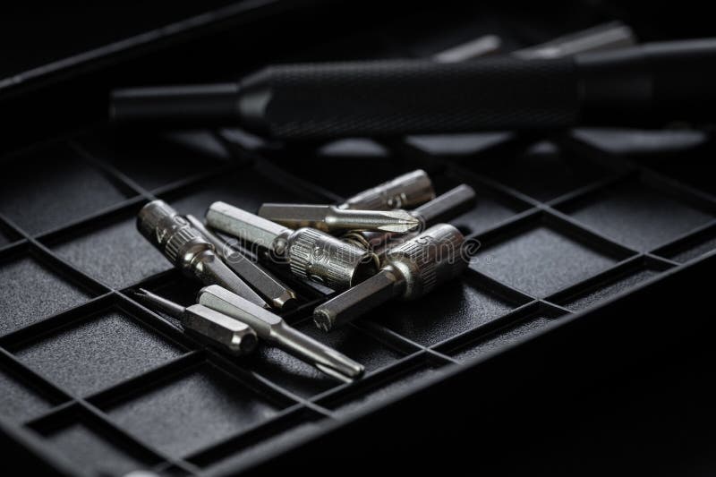 Torx Drive Bit and Aluminum Bit Driver on Black Sorting Tray. Screws ...