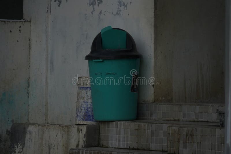 Trash cans stock image. Image of light, iron, cans, yellow - 227783457