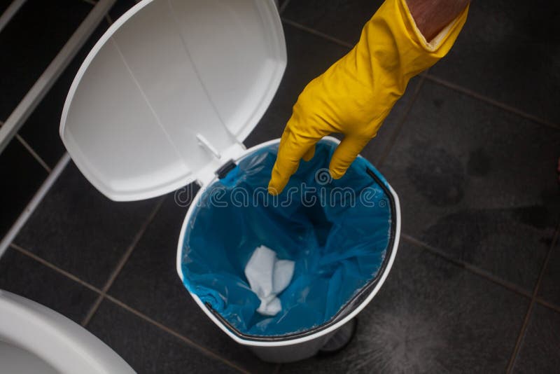 Toss Napkin into Trash in the Bathroom. Disposing Toilet Paper, Putting ...