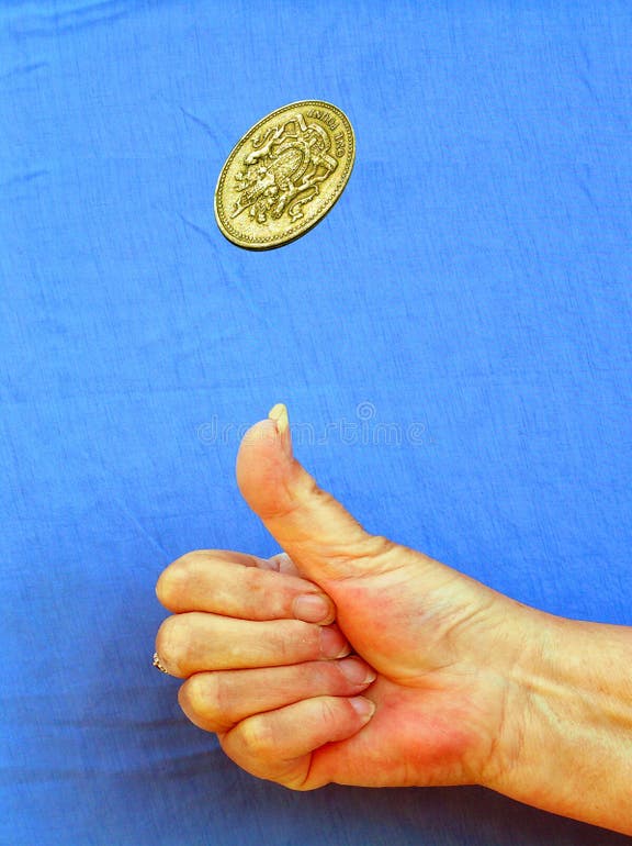 Tossing a Coin stock photo. Image of gold, hand, pound - 129590