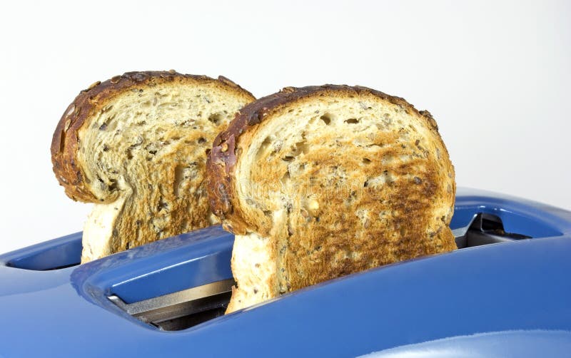 Tostada y tostadora foto de archivo. Imagen de rebanadas - 12733916