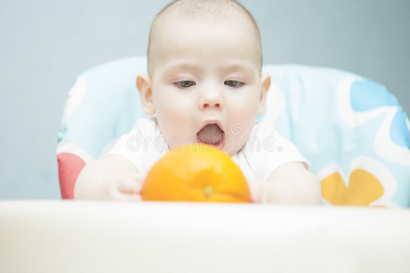 Tot and orange stock image. Image of person, innocence - 25882949