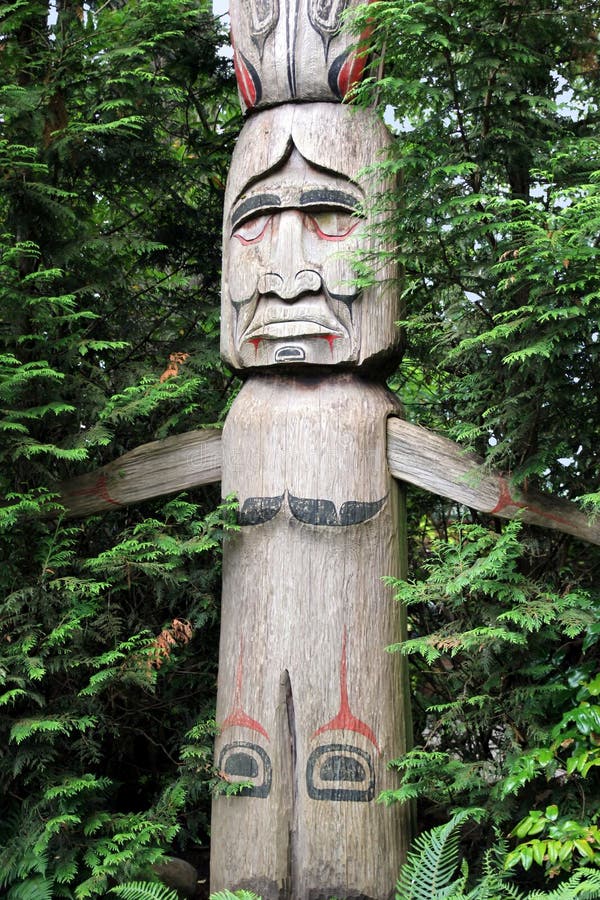 Totem pole in forest stock photo. Image of tree, wood - 21802648