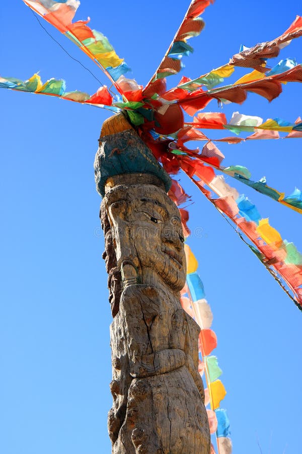 Totem Pole and Prayer Flags Stock Image - Image of china, pole: 24993185