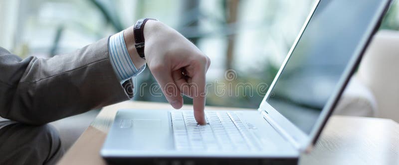 Touch of a Finger To the Laptop Computer Keyboard, Side View Stock ...