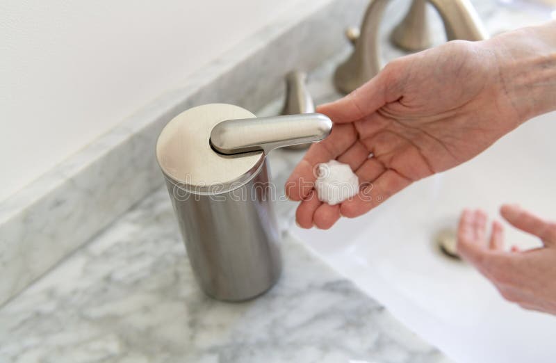 Hand Disposing Foaming Soap from Touch less Pump Stock Image - Image of ...