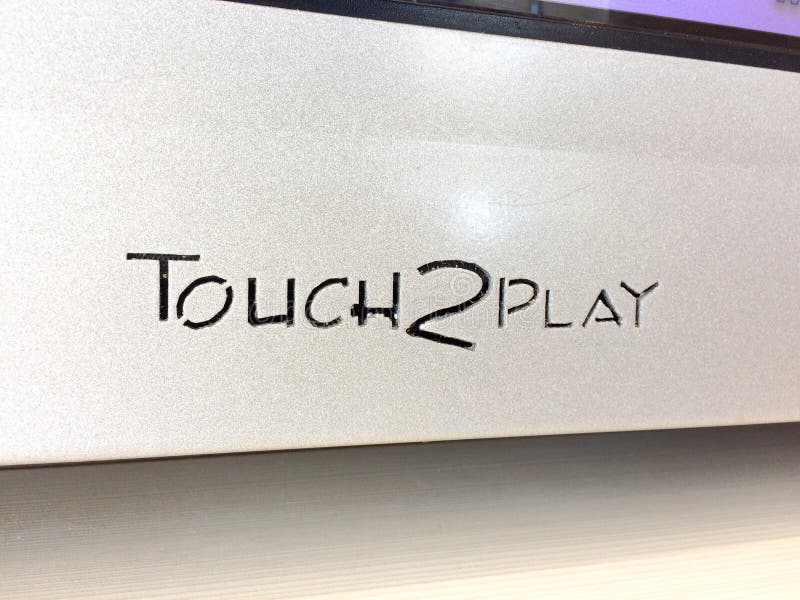 Touch 2 Play Logo on Touchscreen Editorial Image - Image of business ...