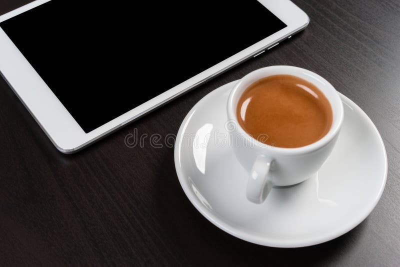 Touch tablet and coffee stock image. Image of coffee - 69783323